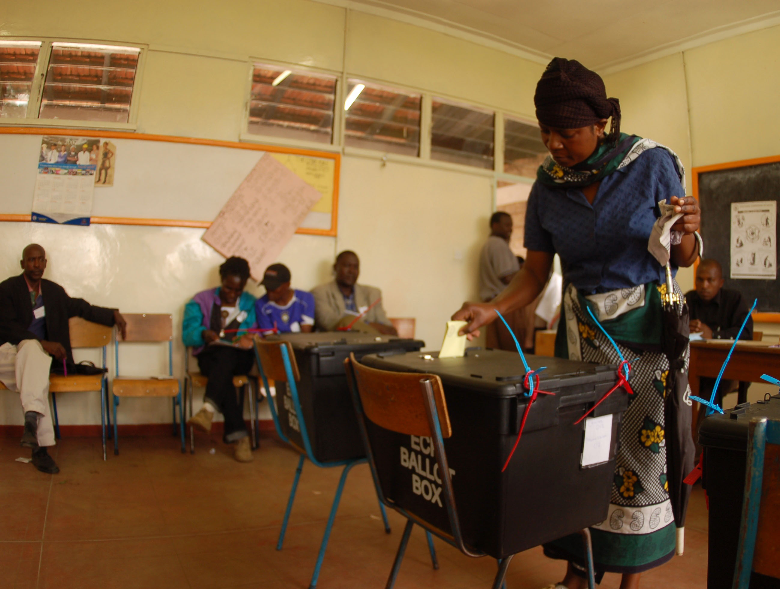 A woman casts her vote at the St. Teresa polling station in Starehe ...