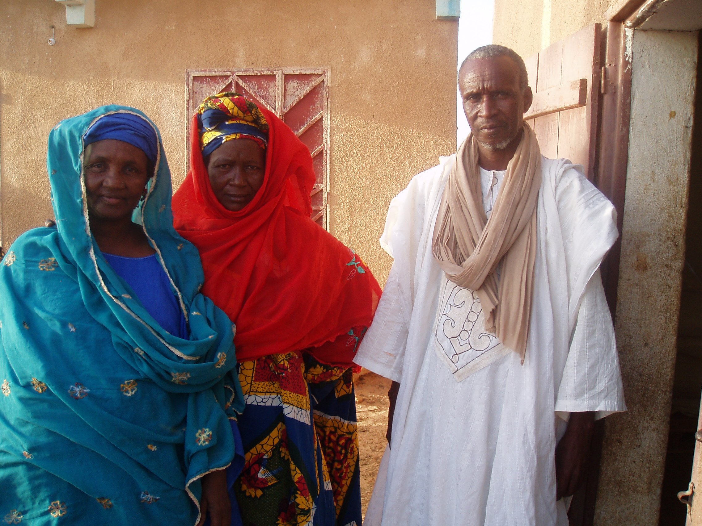 Members of the village committee which manages the grain bank in Sayene ...