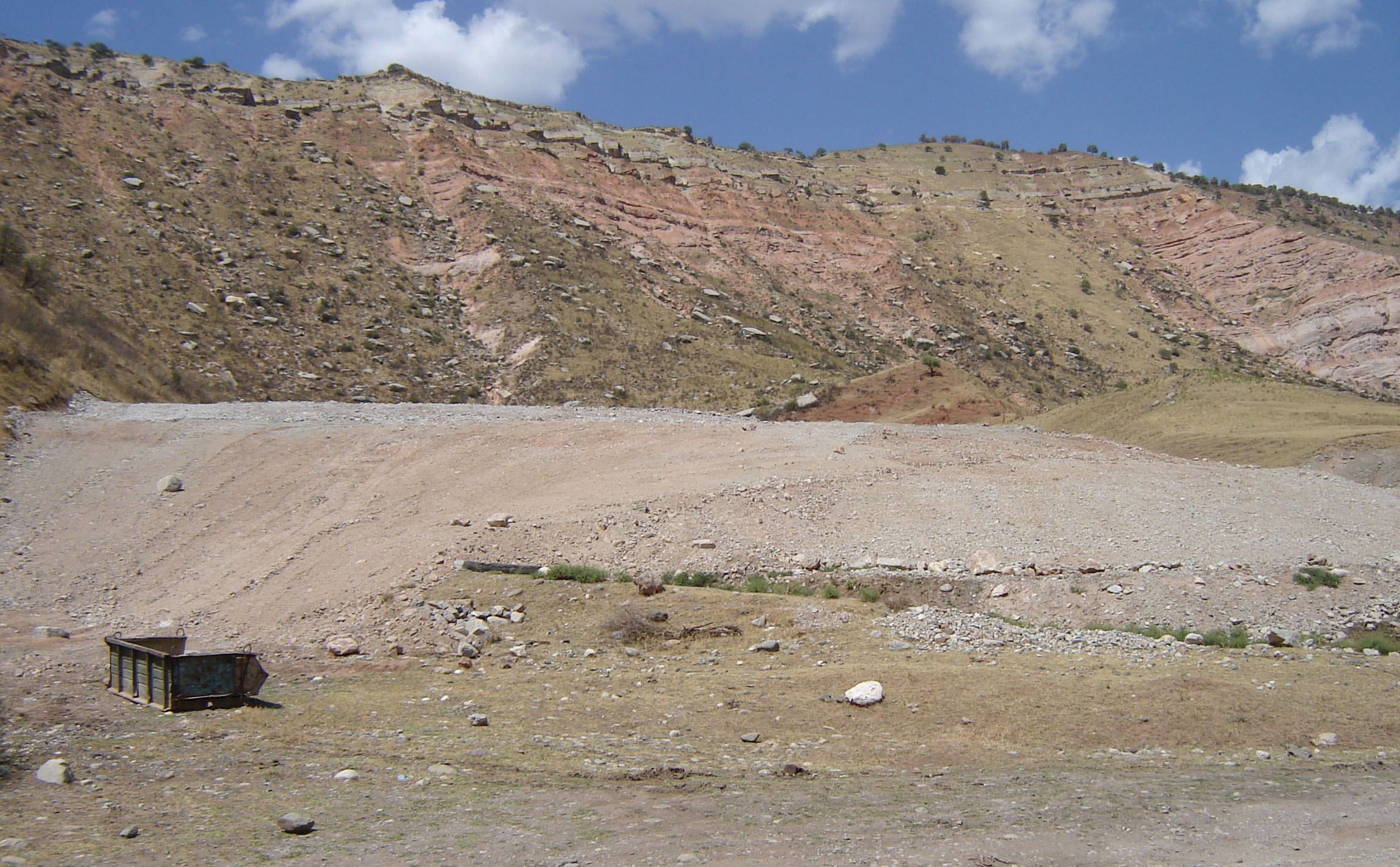 A warning sign in Russian says: Forbidden area due to radioactive waste ...