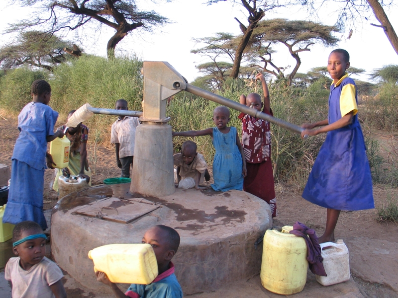 Children fetching water in the eastern Kenya district of Isiolo ...