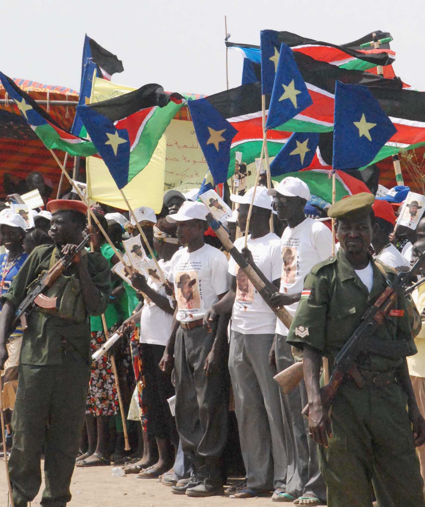 Sudanese supporters of the south's SPLM party wave the southern flag at ...
