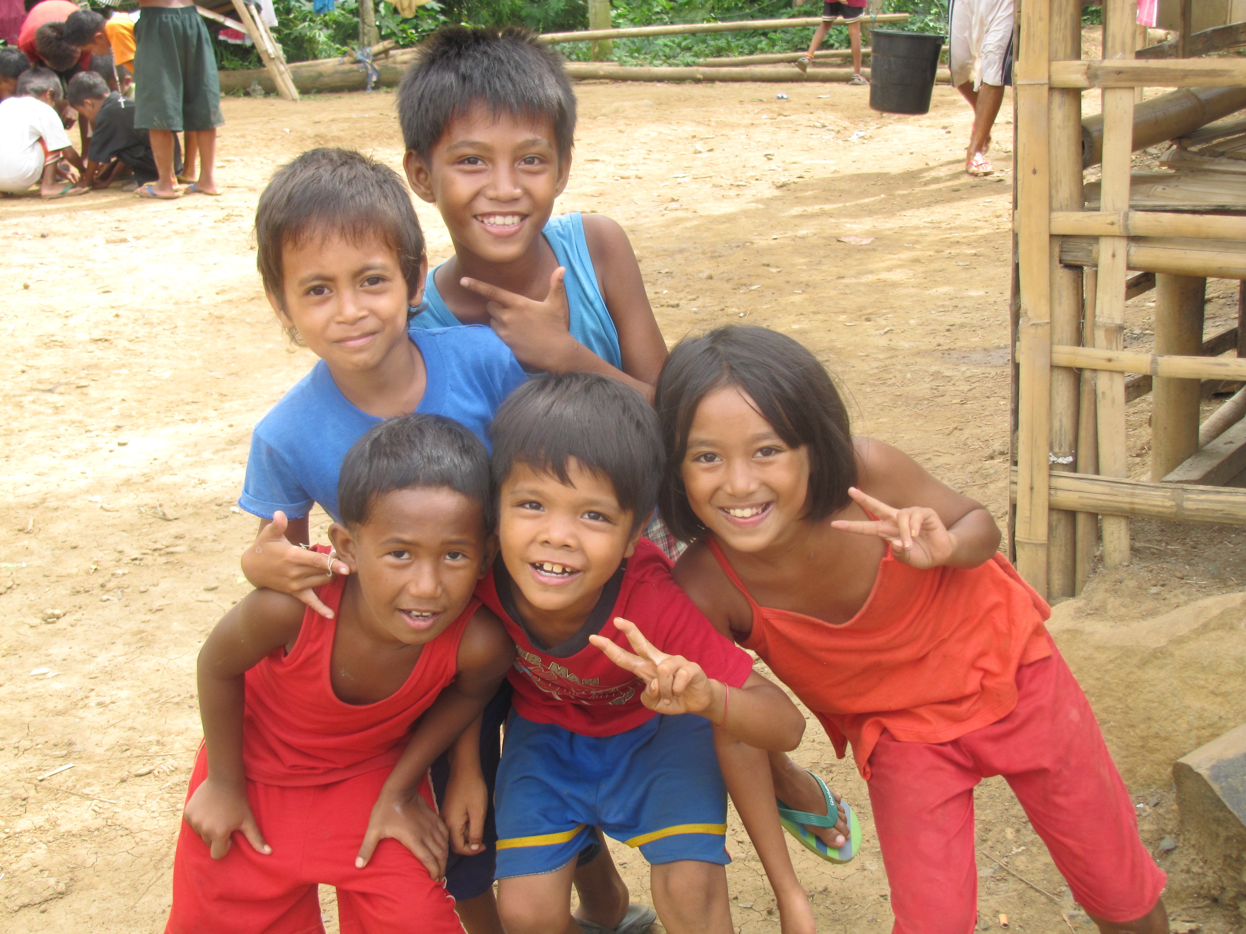 Children at a IFRC transitional shelter project in Rizal Province ...
