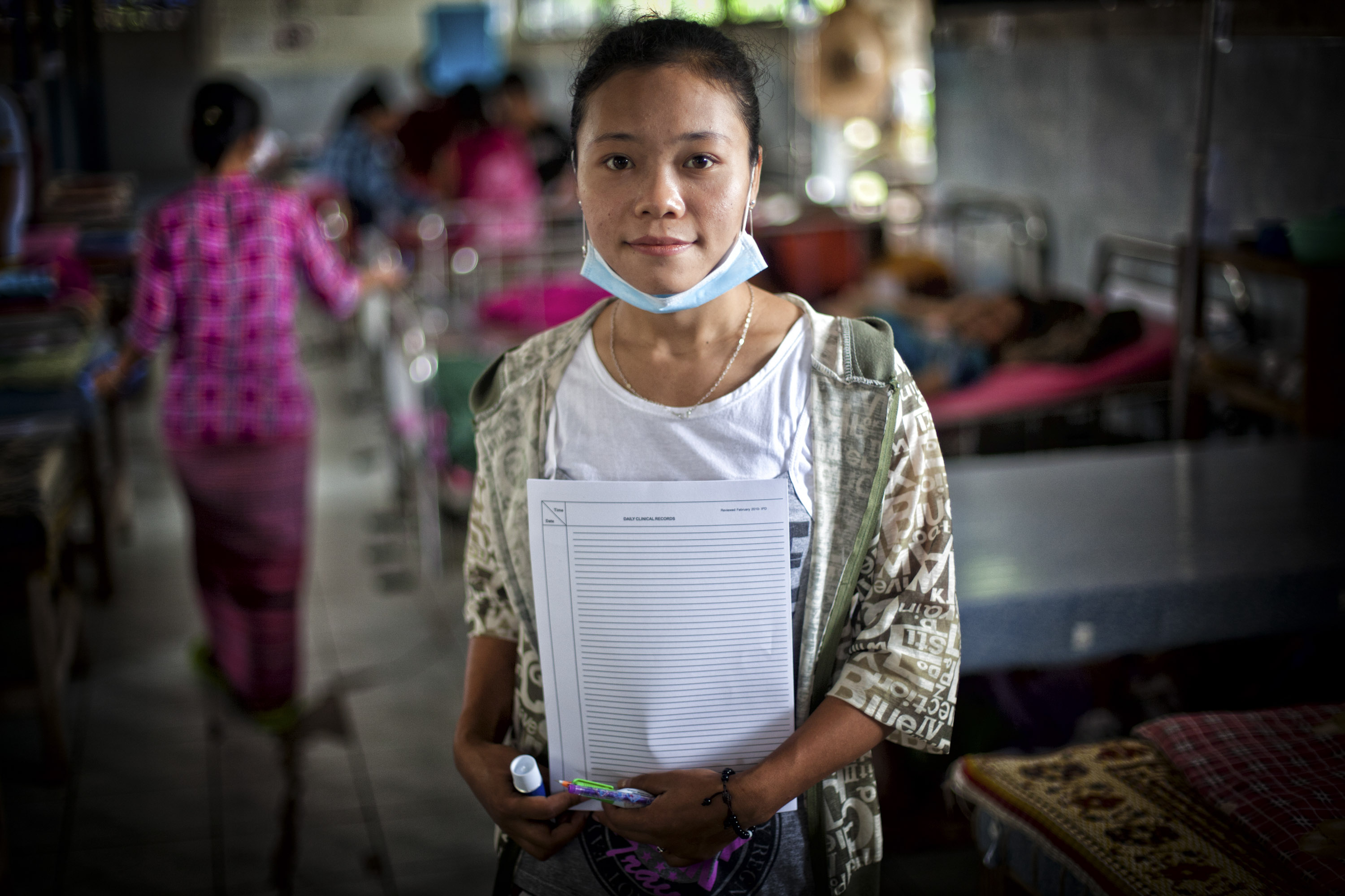 Ethnic Karen trained medic Lway Poe Whaung, 23, attending to the sick at the Mae Tao clinic in ...
