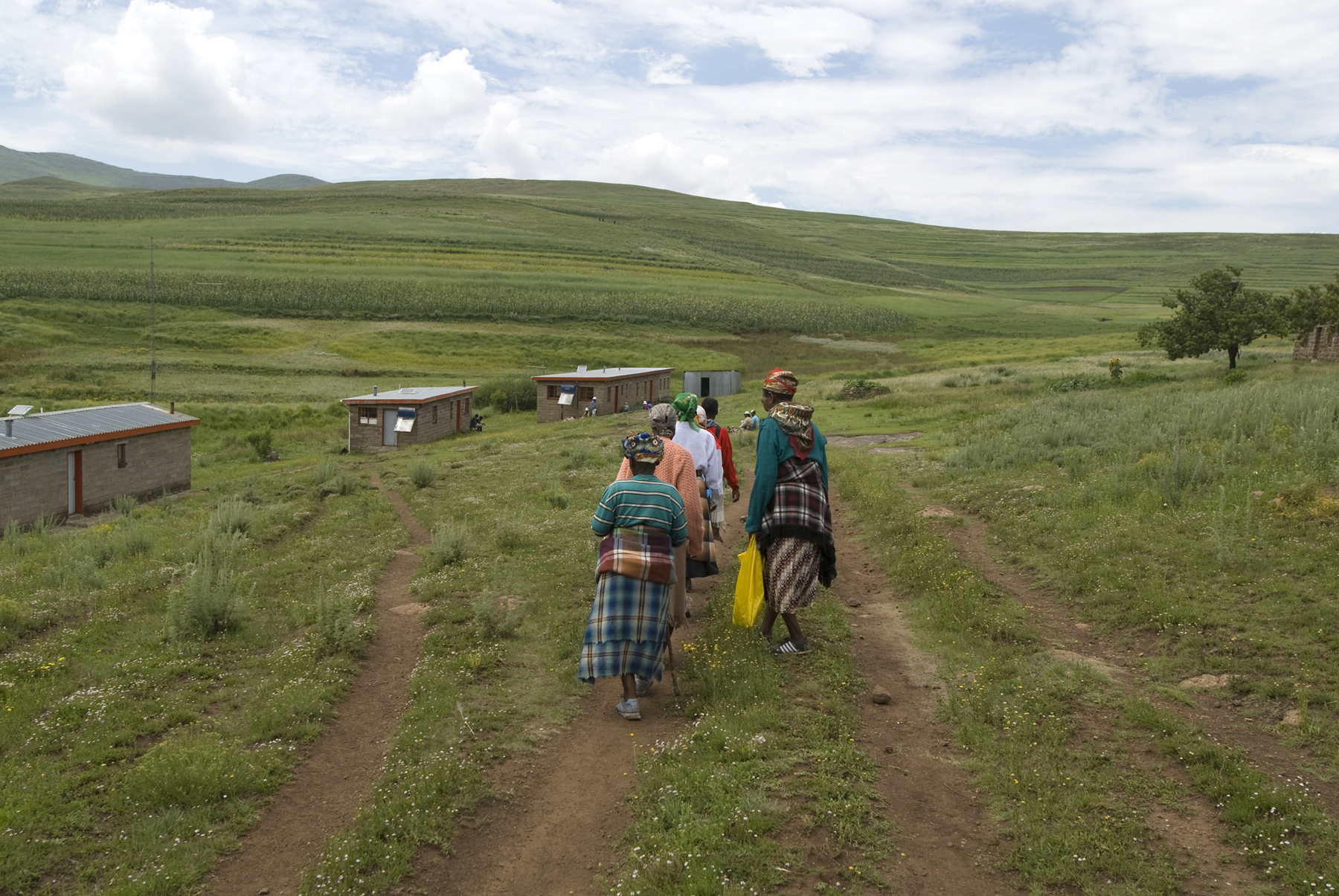 Women head for Semenanyane clinic in the mountainous district of Thaba ...
