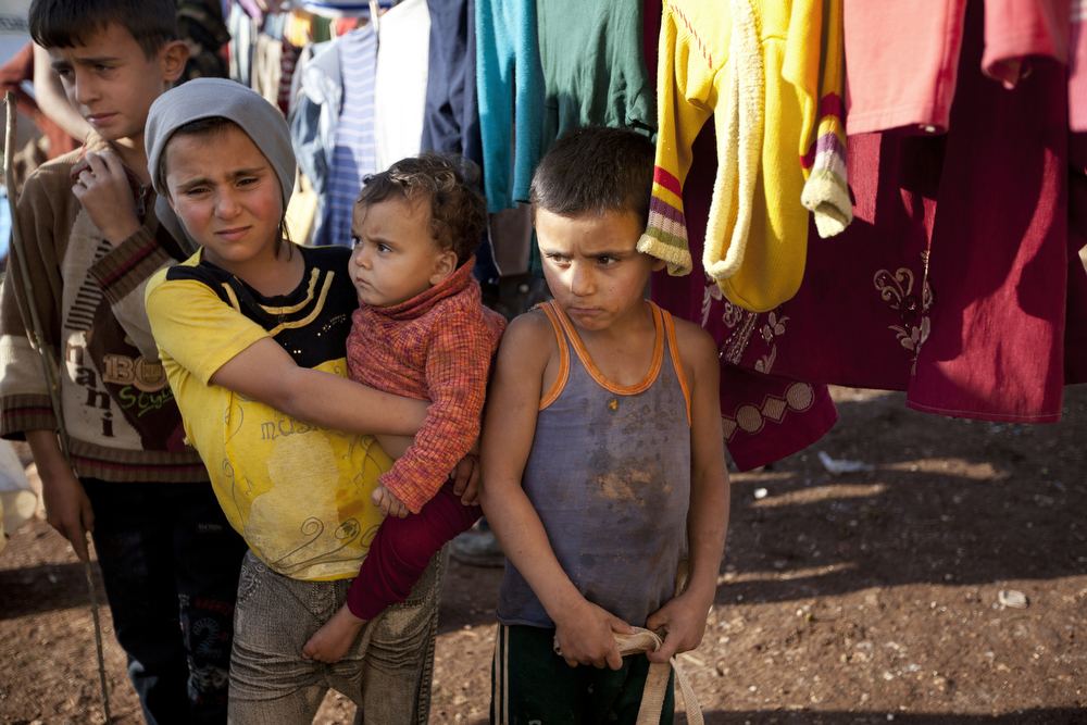 Children at Atma camp for displaced Syrians near the Turkish border ...