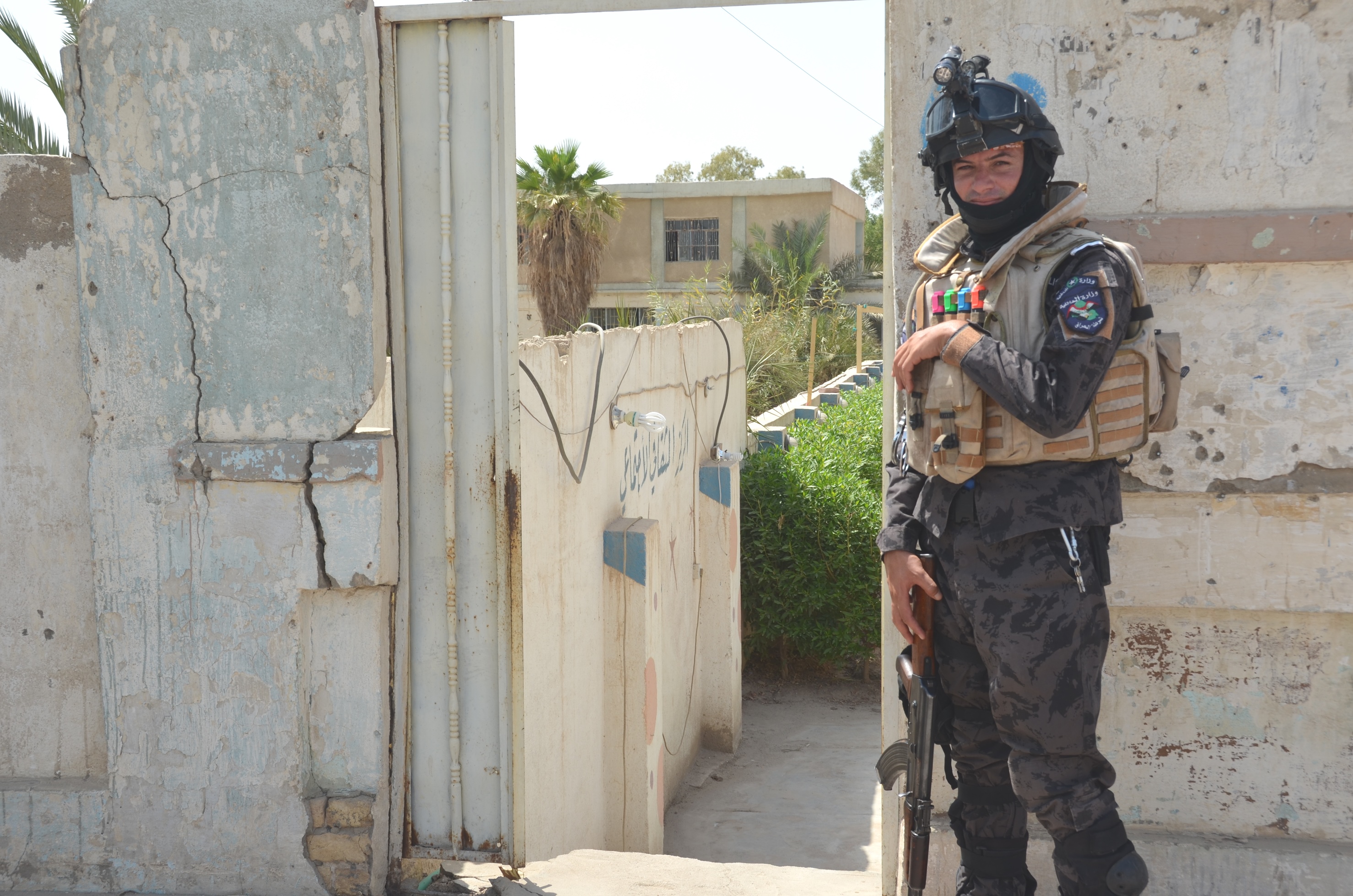 A member of Iraq's SWAT police - tasked with escorting UN staff as they ...